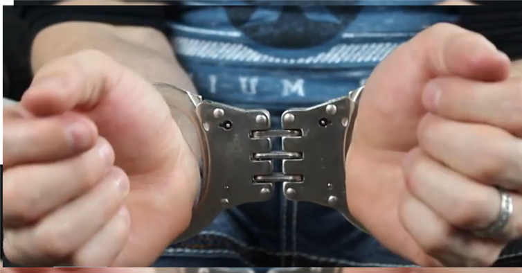 How To Escape Handcuffs In 5 Seconds Using Nothing But Paperclip. He is ...